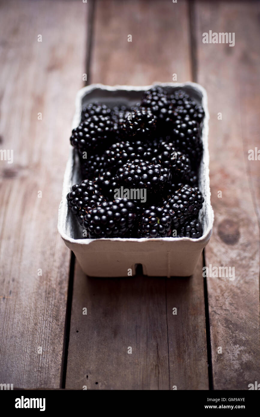 Cardboard box of blackberries Stock Photo - Alamy