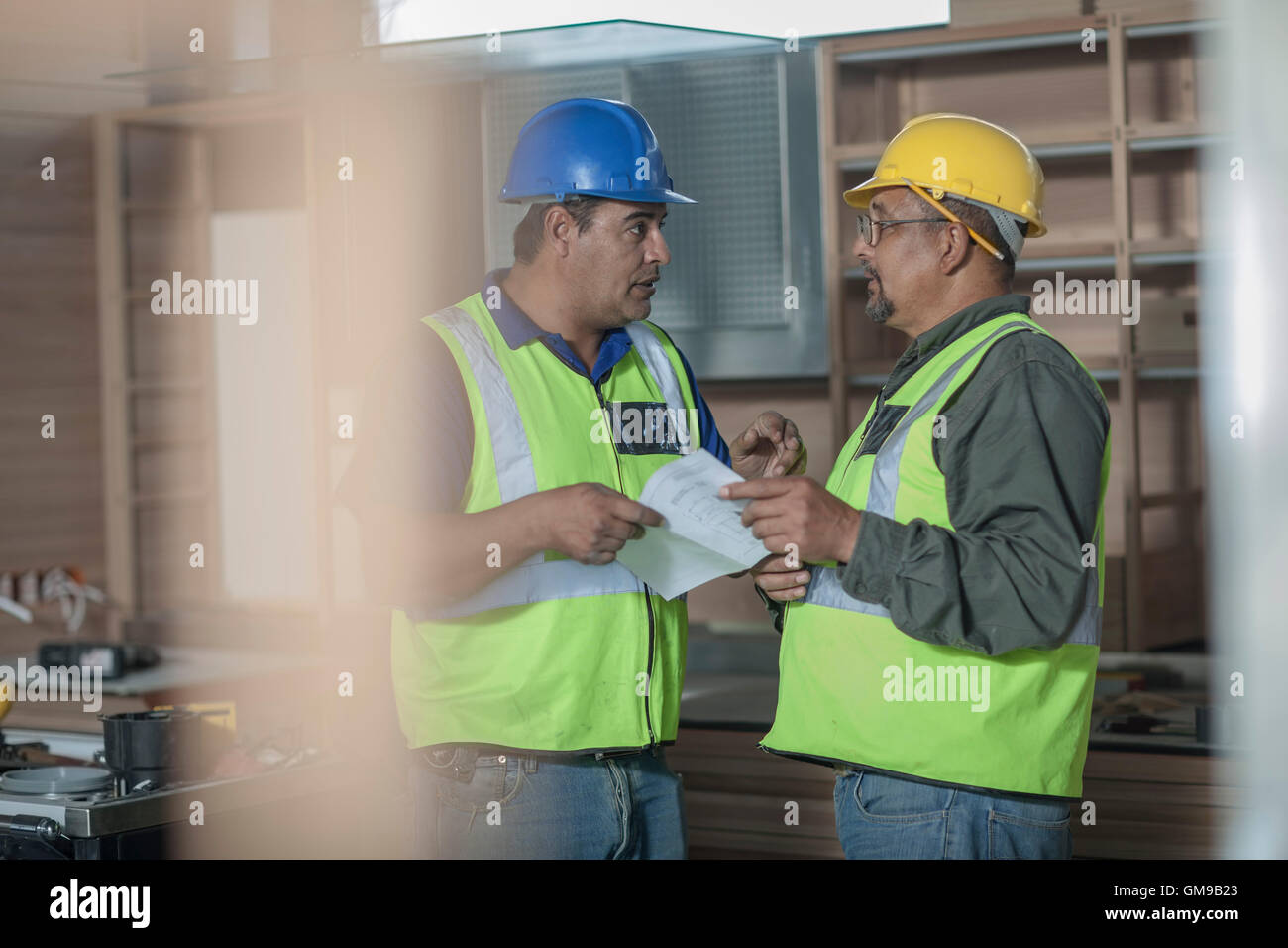Construction Workers Talking High Resolution Stock Photography and ...