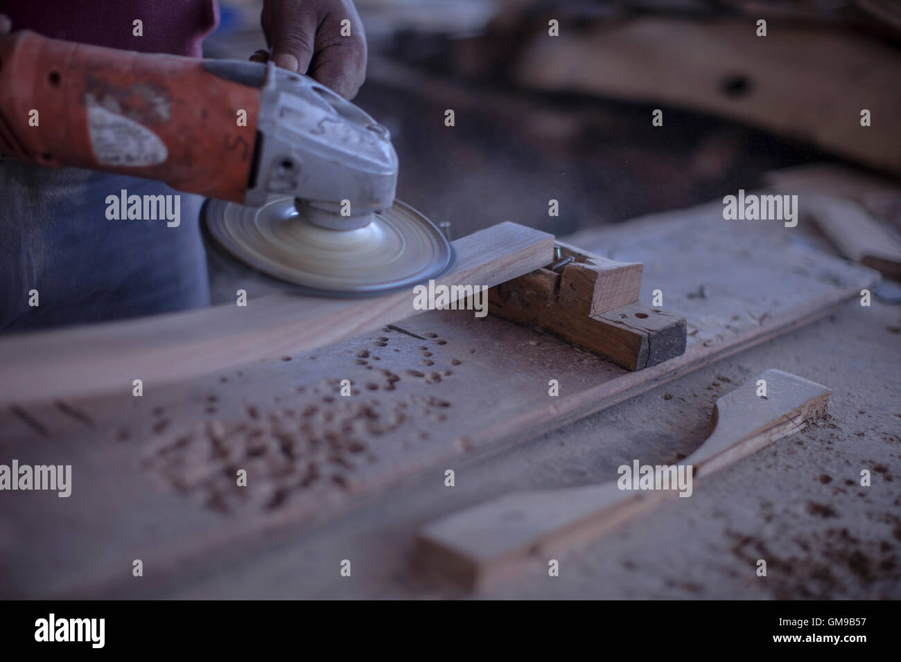 Copper working with wood grinder hi-res stock photography and images ...