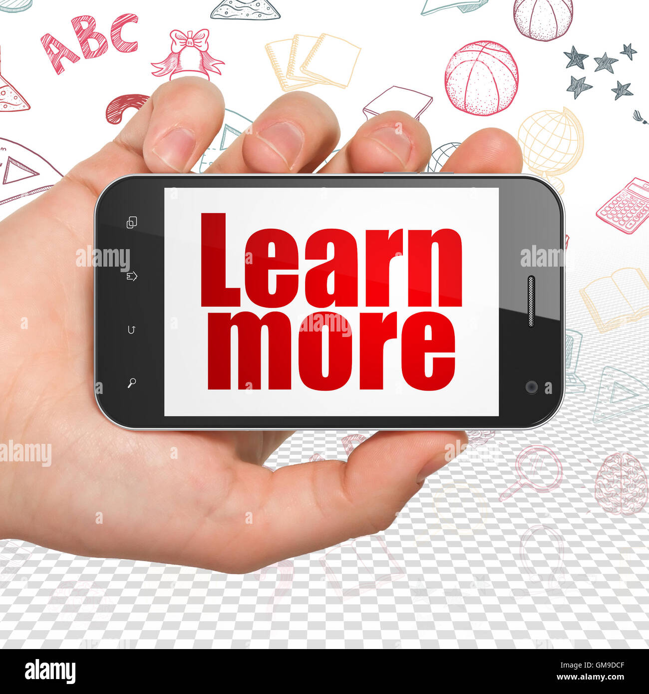 Education concept: Hand Holding Smartphone with Learn More on display ...