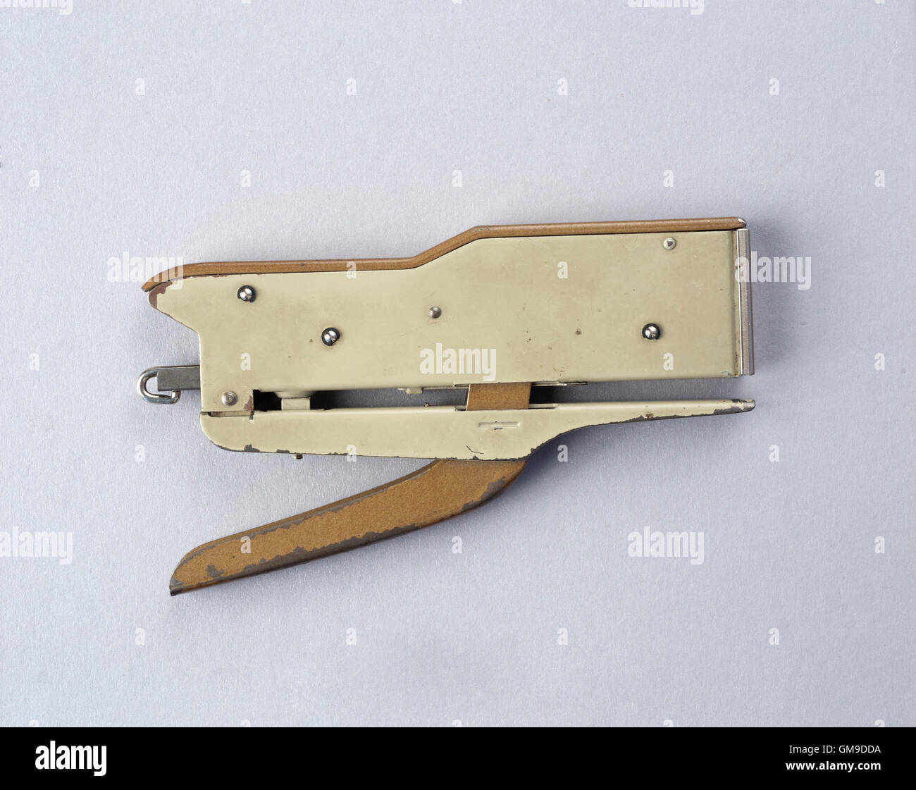 Old used metallic stapler still life Stock Photo - Alamy