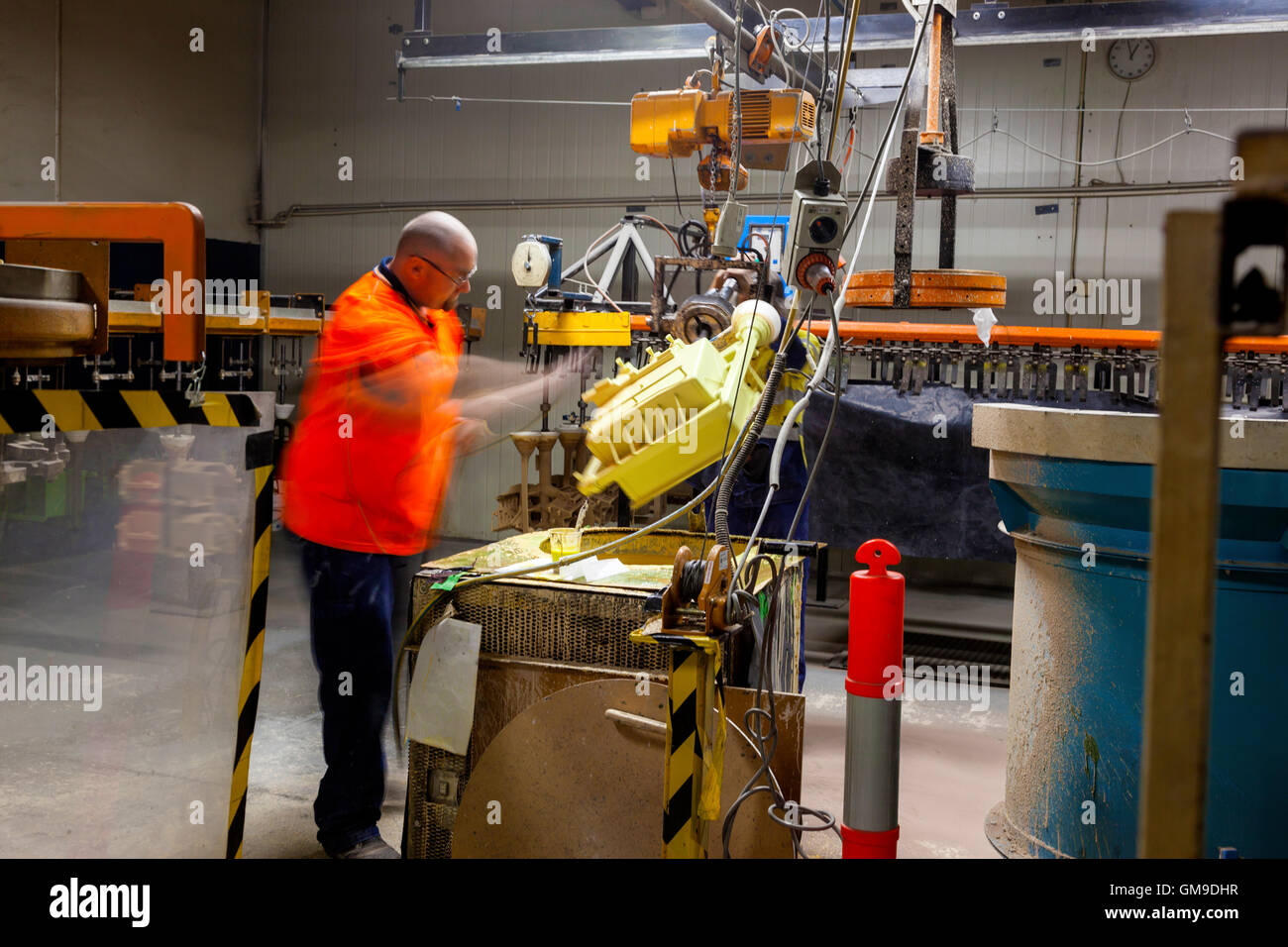 factory workers in a foundery Stock Photo - Alamy