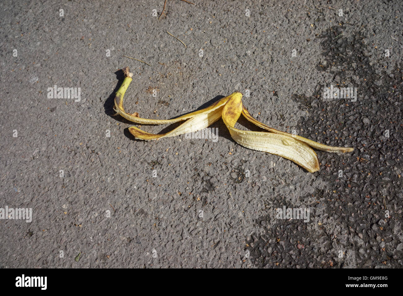 Banana Skin Discarded on the Road -2 Stock Photo - Alamy