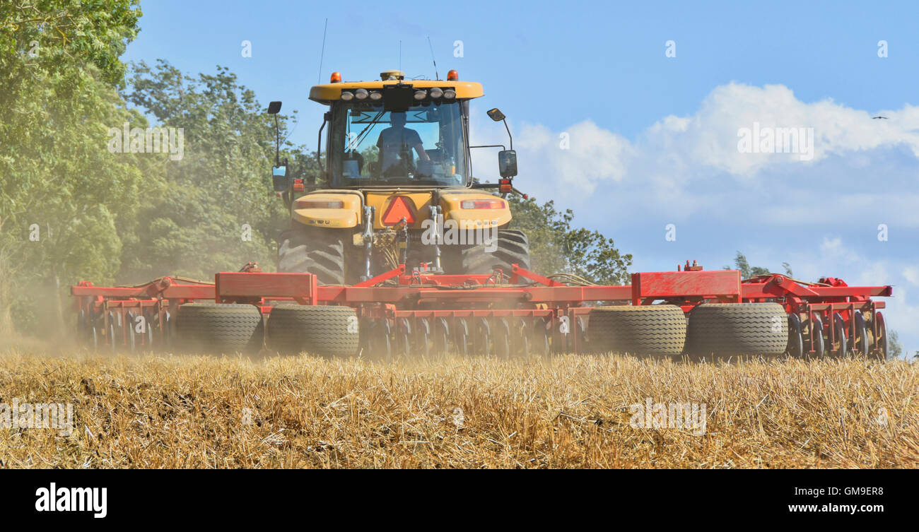 Vaderstad Rexius cultivator equipment working behind a Caterpillar ...