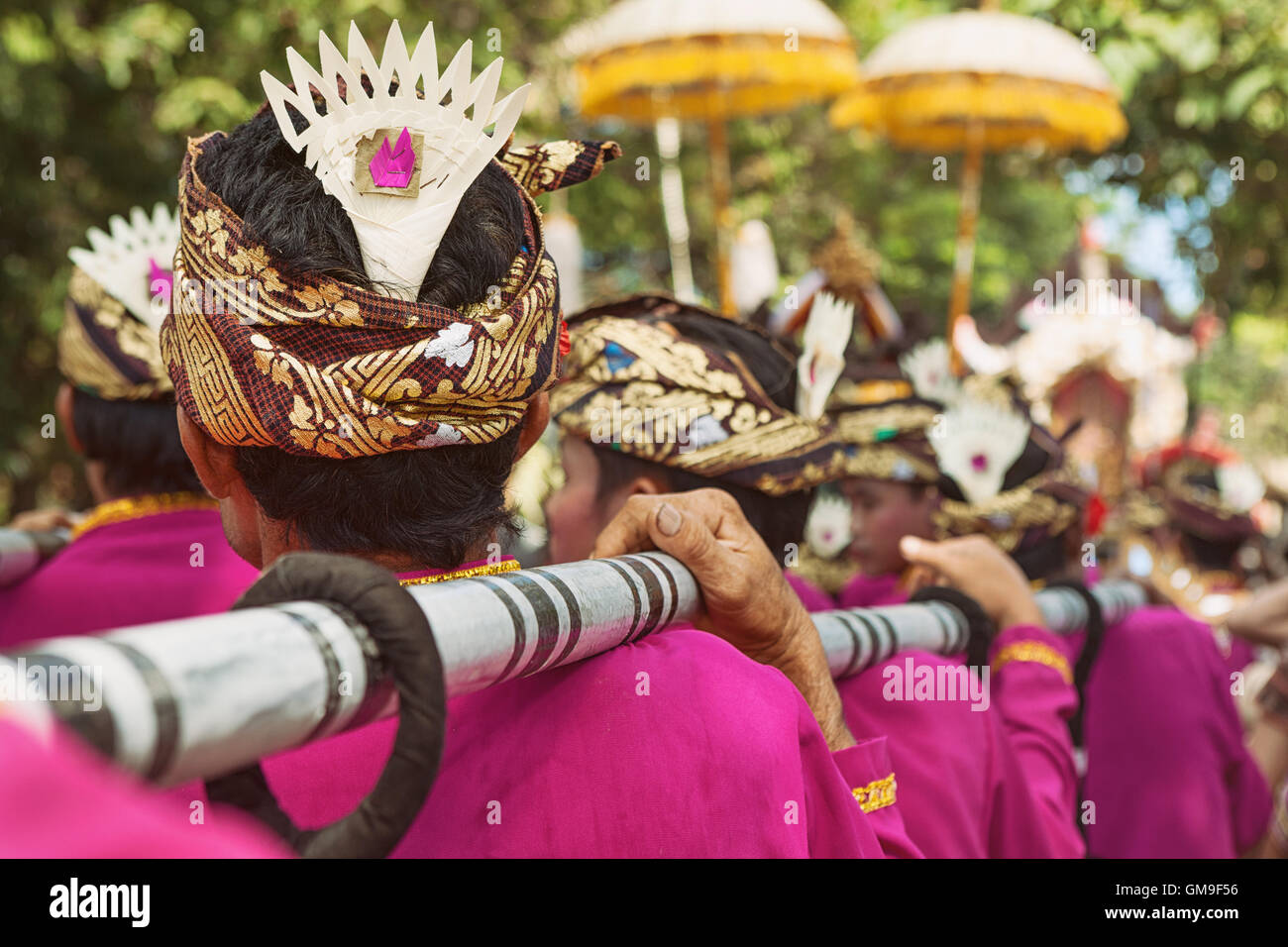 Group of Balinese men in ethnic costumes - musicians of traditional ...