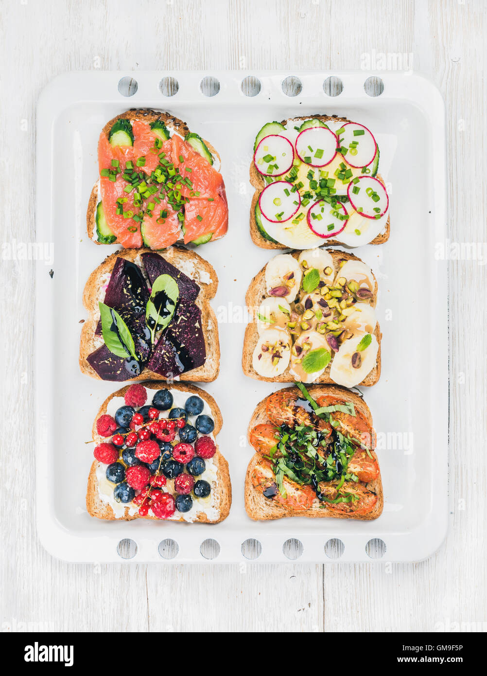 Sweet and savory breakfast toasts assortment. Sandwiches with fruit ...