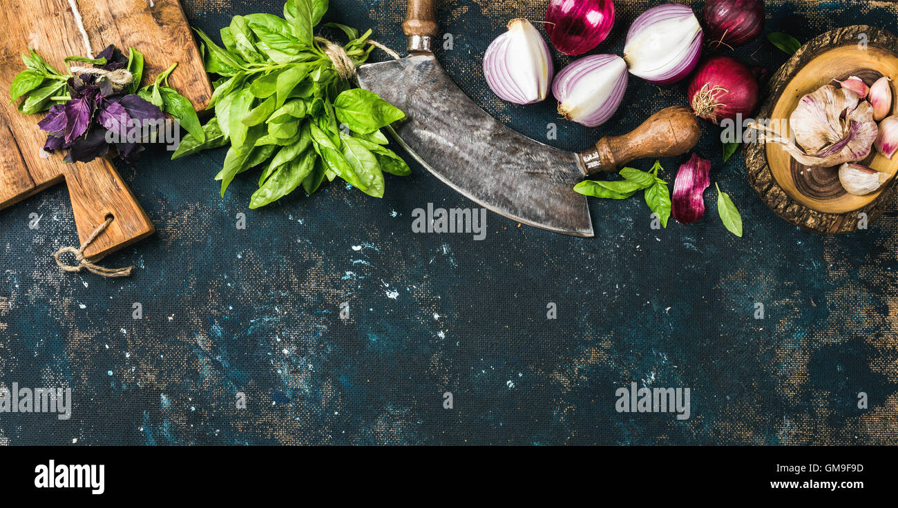 Healthy food cooking background over grunge dark blue plywood texture ...