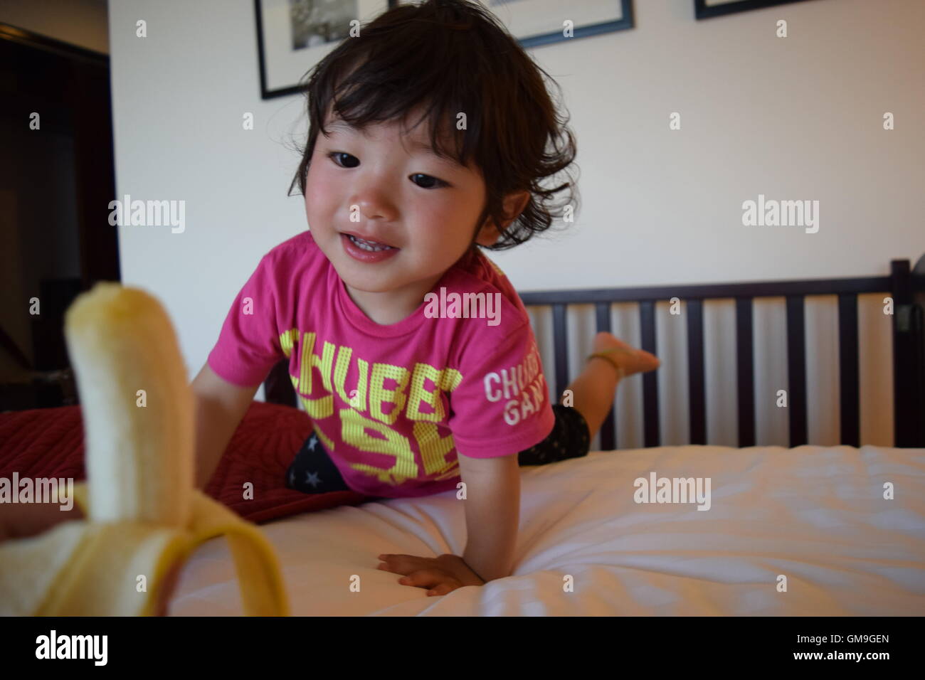 boy is eating my favorite fruit banana Stock Photo - Alamy