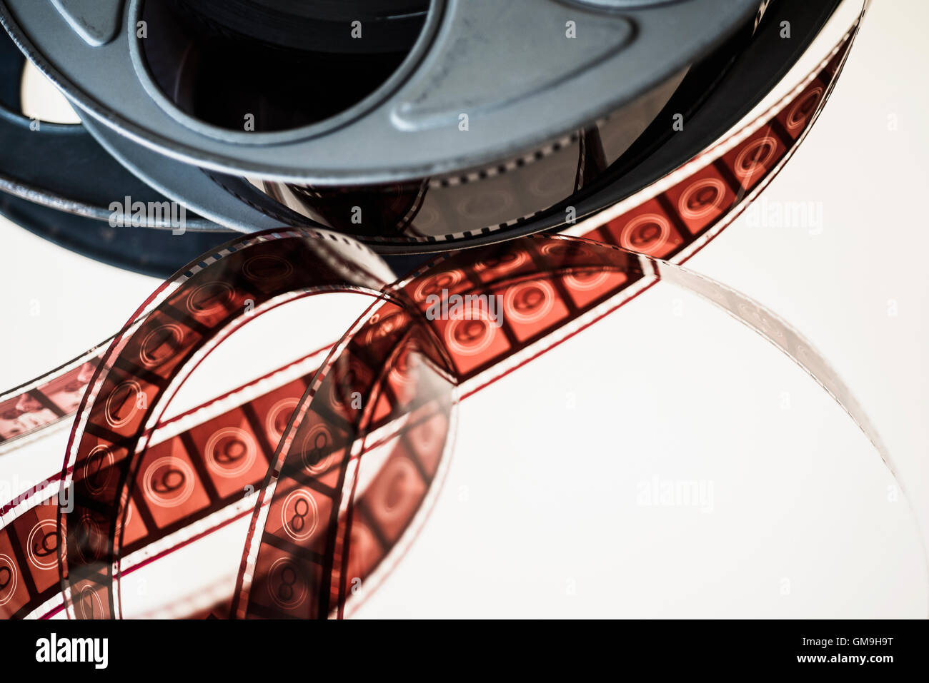 Close-up of film reel against white background Stock Photo - Alamy