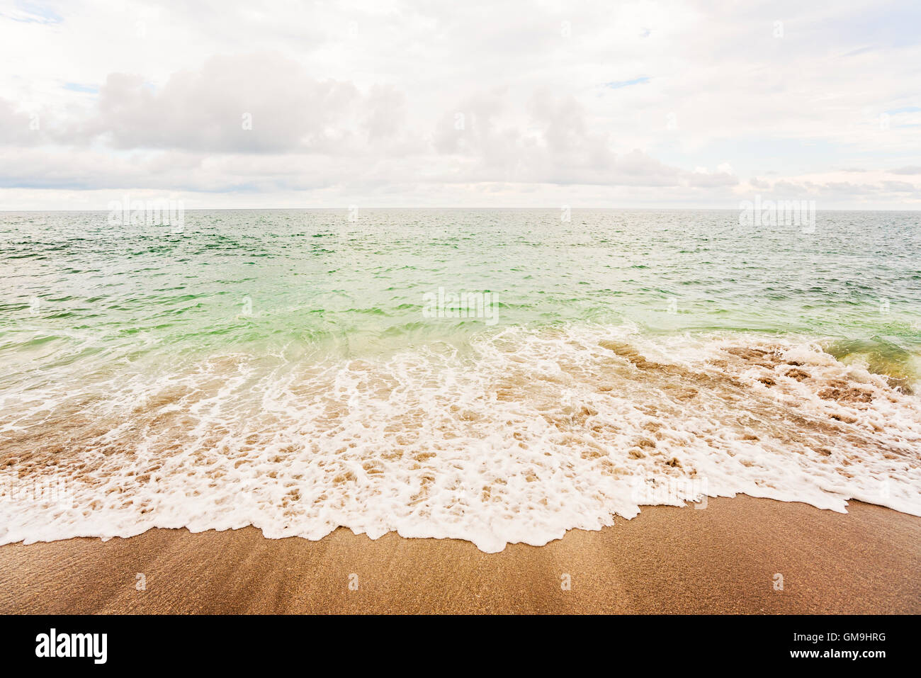 Cloudy sky over sea Stock Photo - Alamy