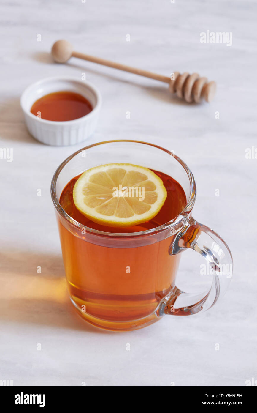 Tea slice lemon honey hi-res stock photography and images - Alamy