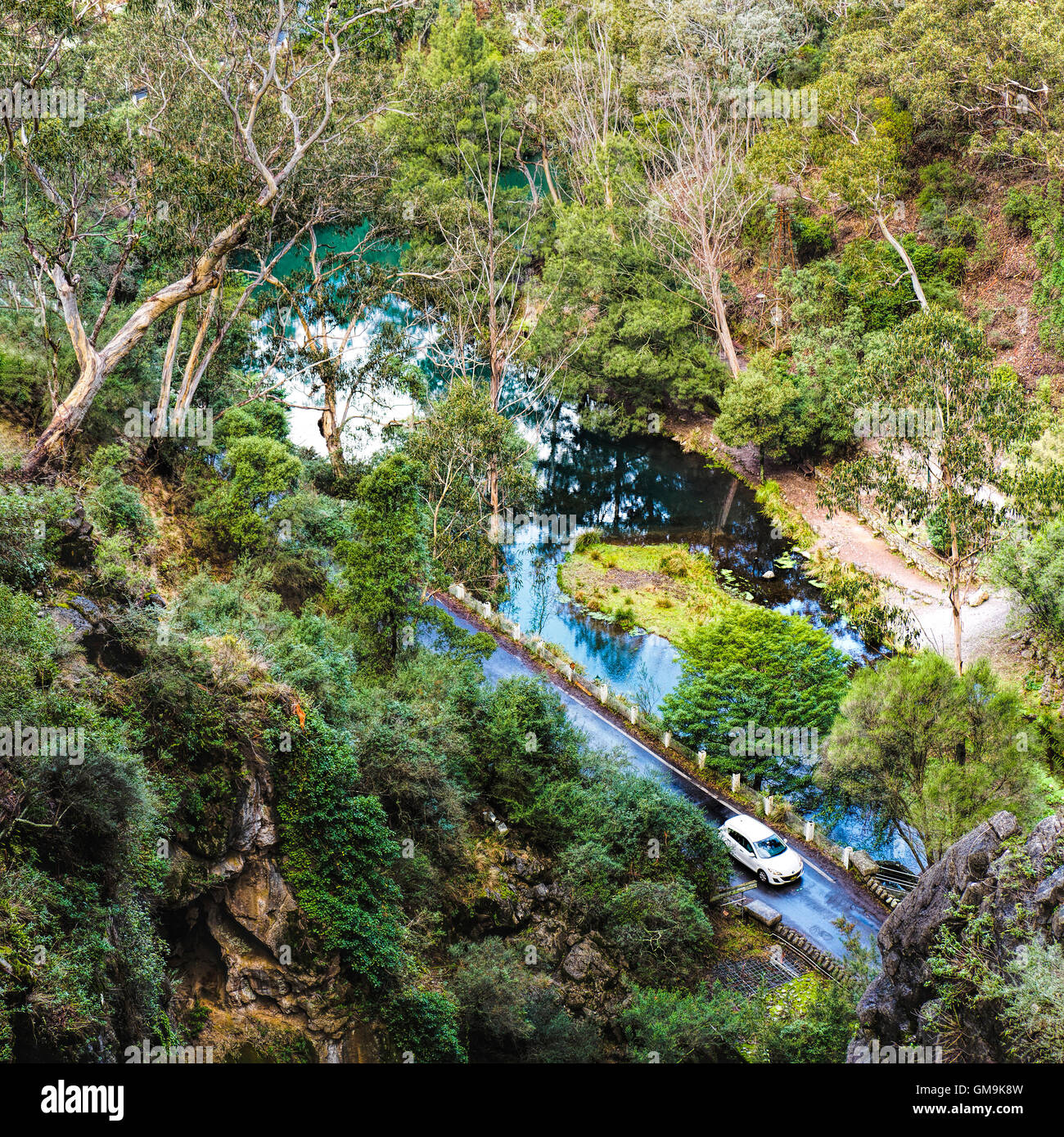 Australia, New South Wales, Jenolan Caves, Blue Lake, Car on road at ...