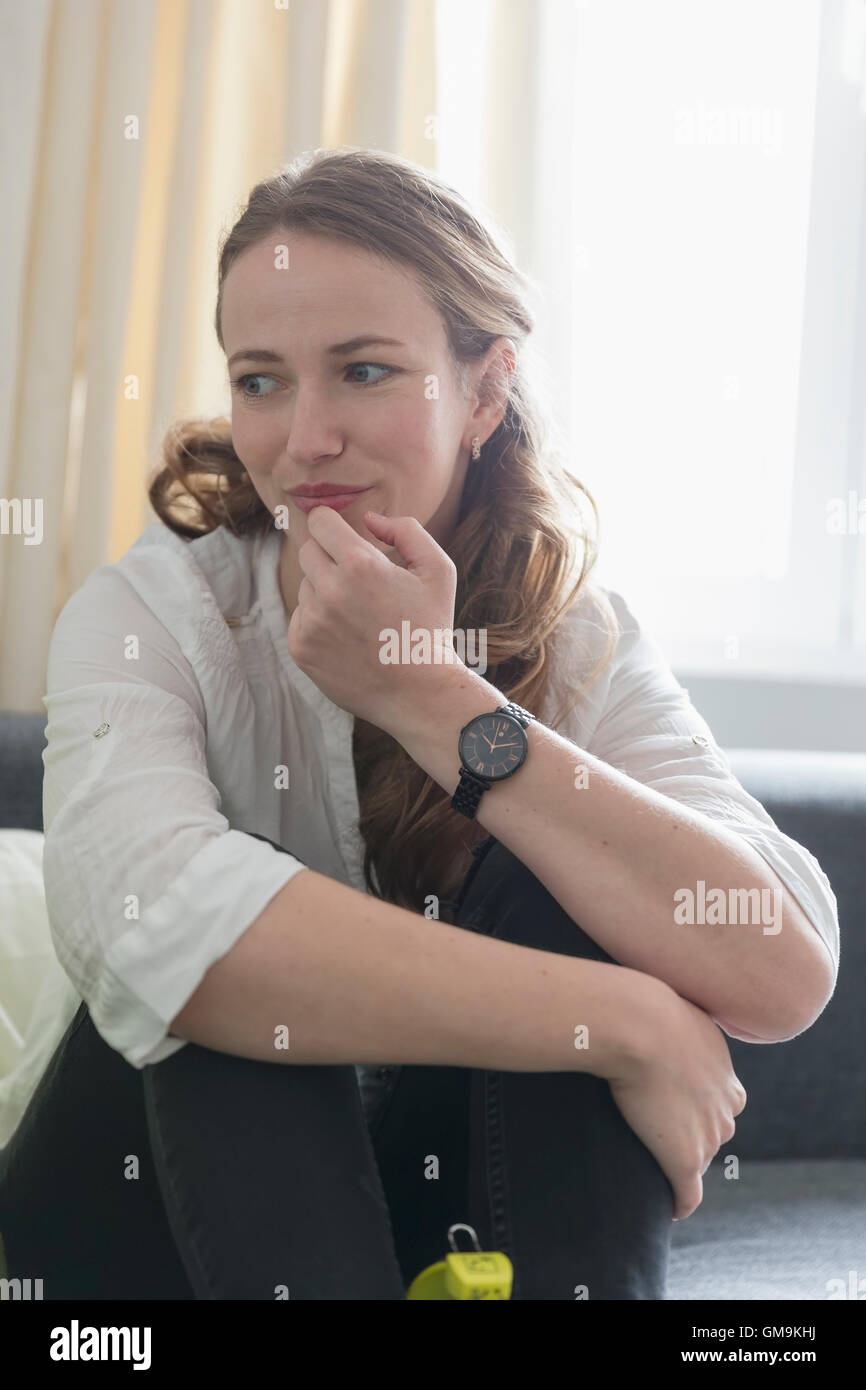 Curled woman hi-res stock photography and images - Alamy