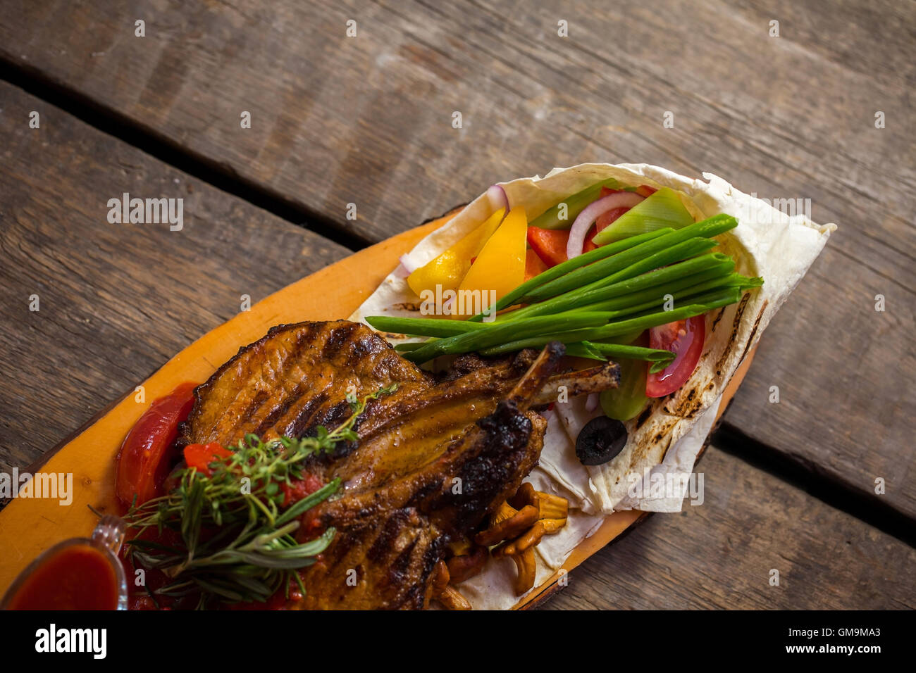 Cooked meat on pita bread Stock Photo - Alamy