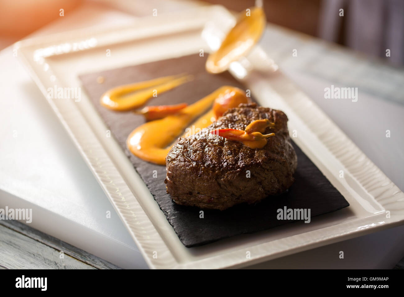 Piece of cooked meat Stock Photo - Alamy