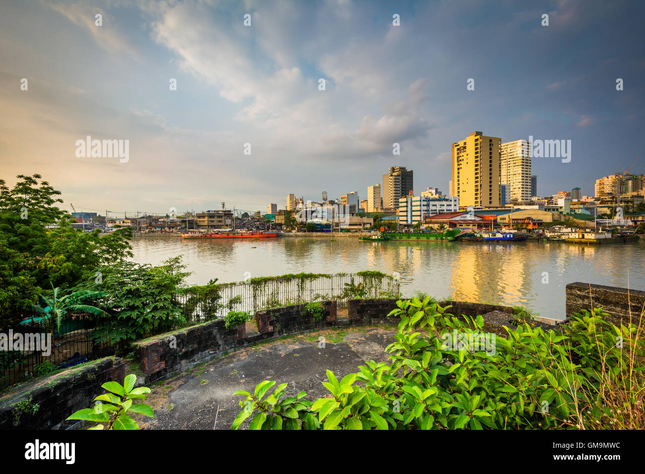 Ruins at Fort Santiago and buildings along the Pasay River, in ...