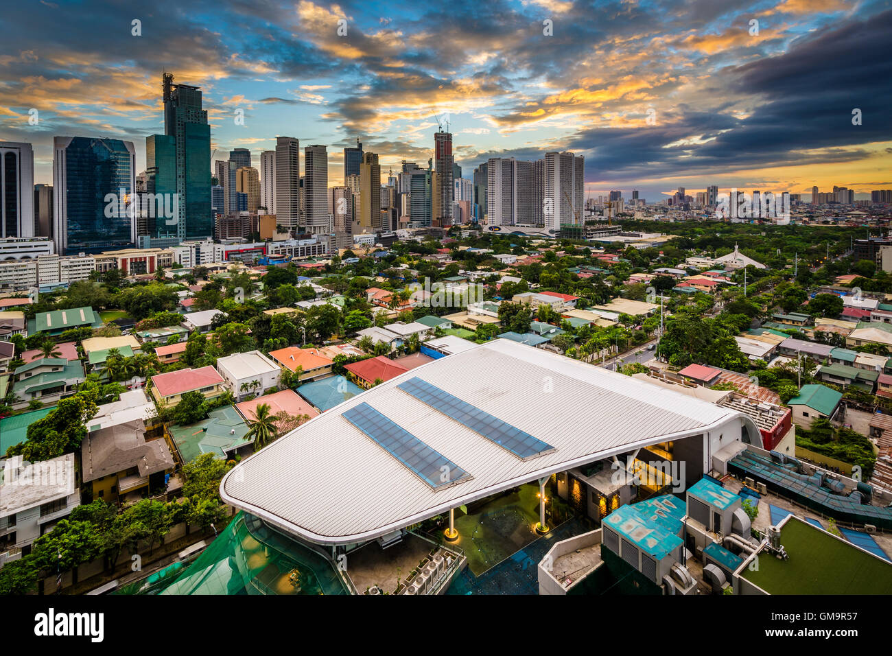 View of the skyline of Makati at sunset, in Metro Manila, The ...