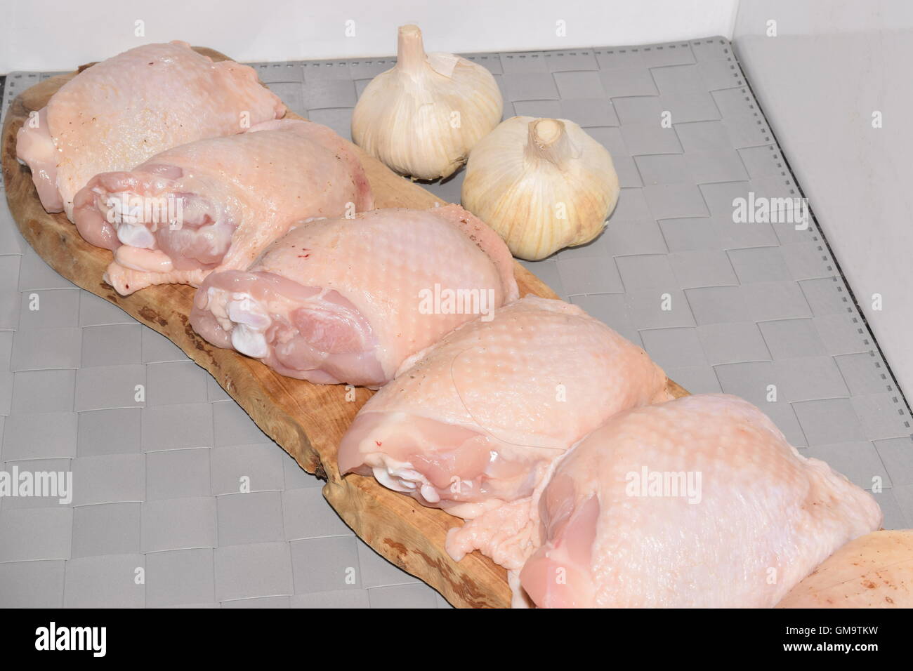Row Chicken Thighs Ready to be Prepared Stock Photo - Alamy