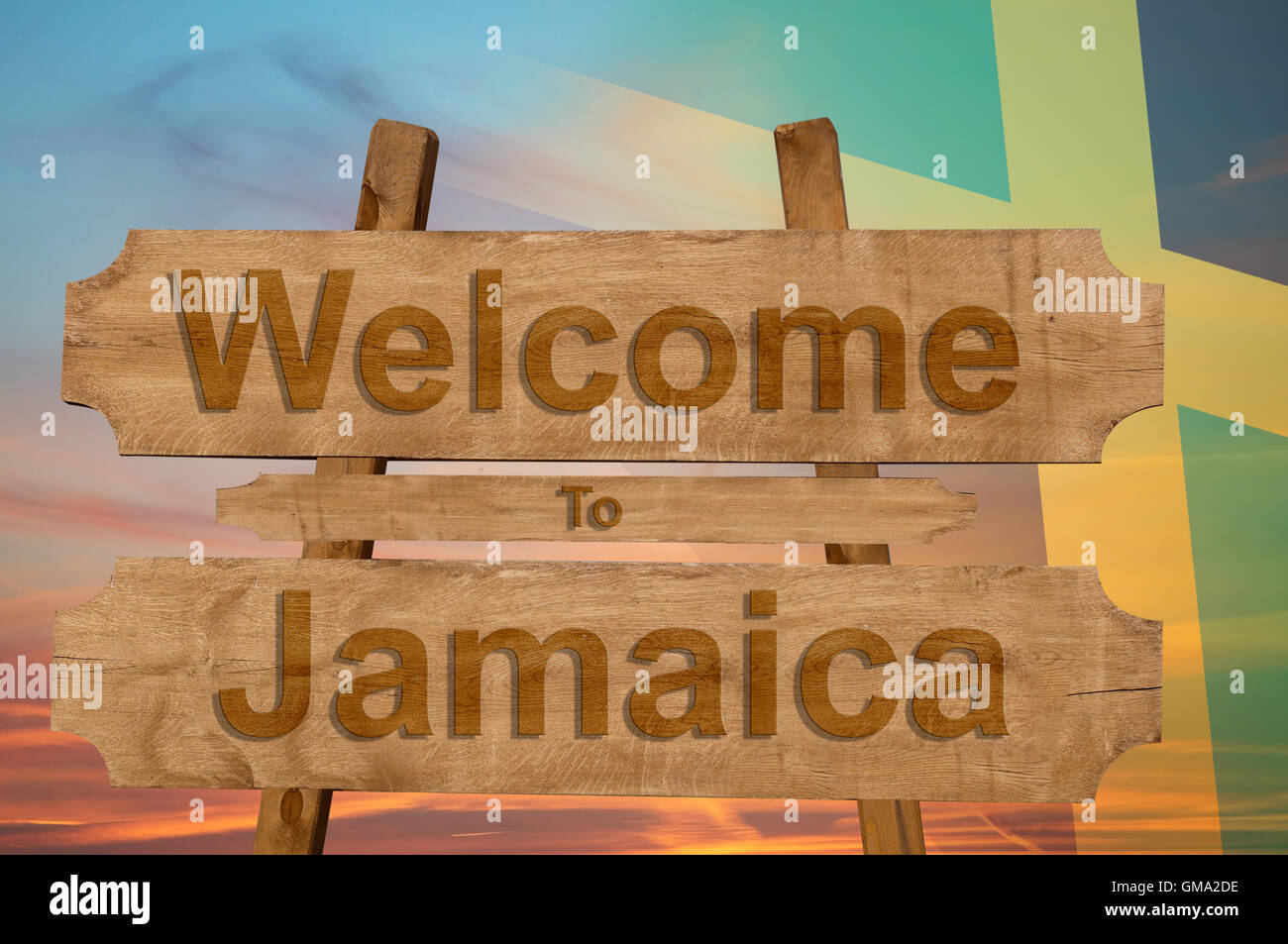Welcome to Jamaica sign on wood background with blending national flag ...