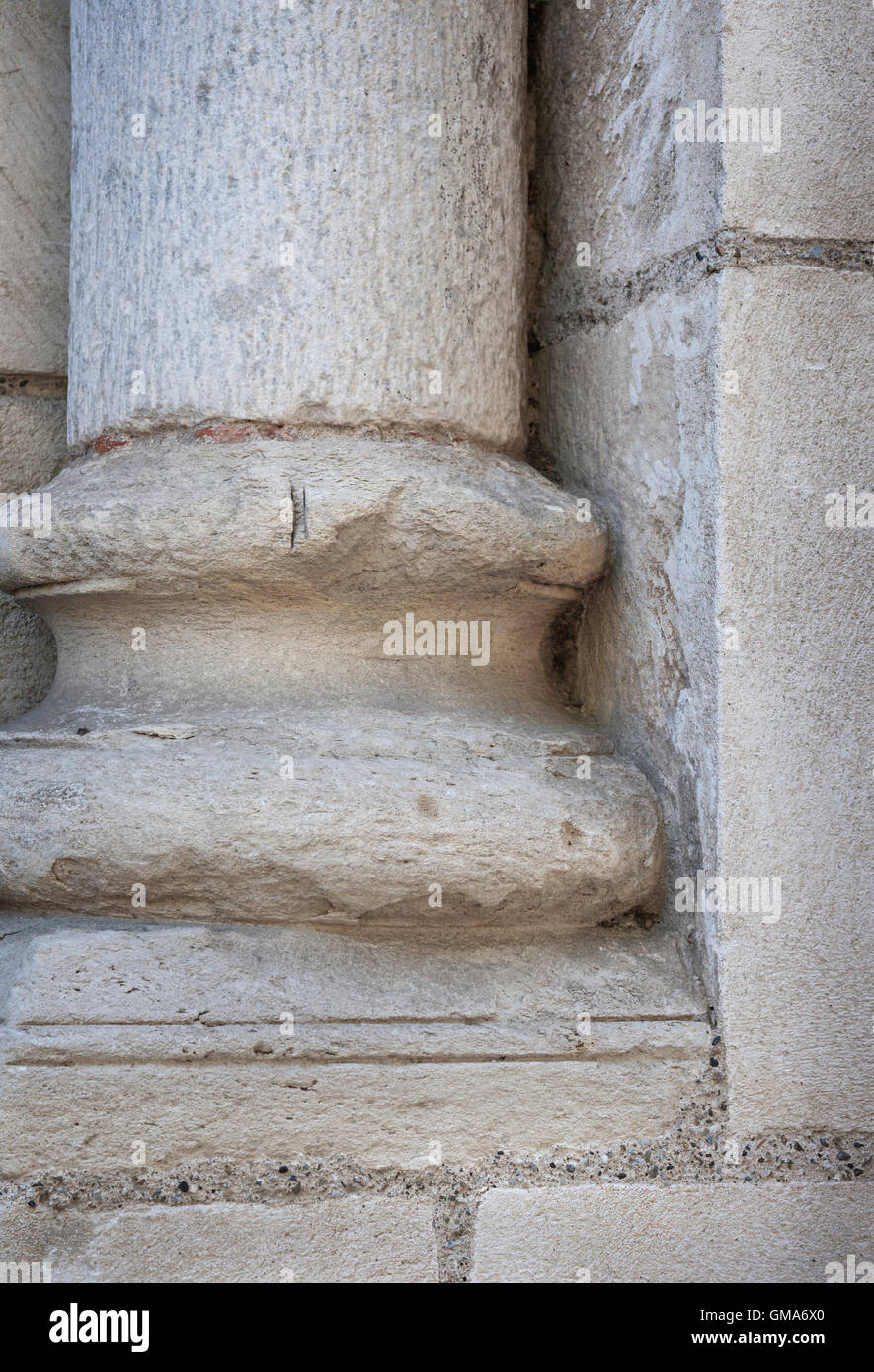 Old stone column plinth or bottom closeup. Architectural detail of ...