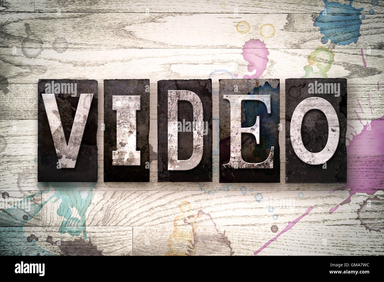 The word "VIDEO" written in vintage dirty metal letterpress type on a ...