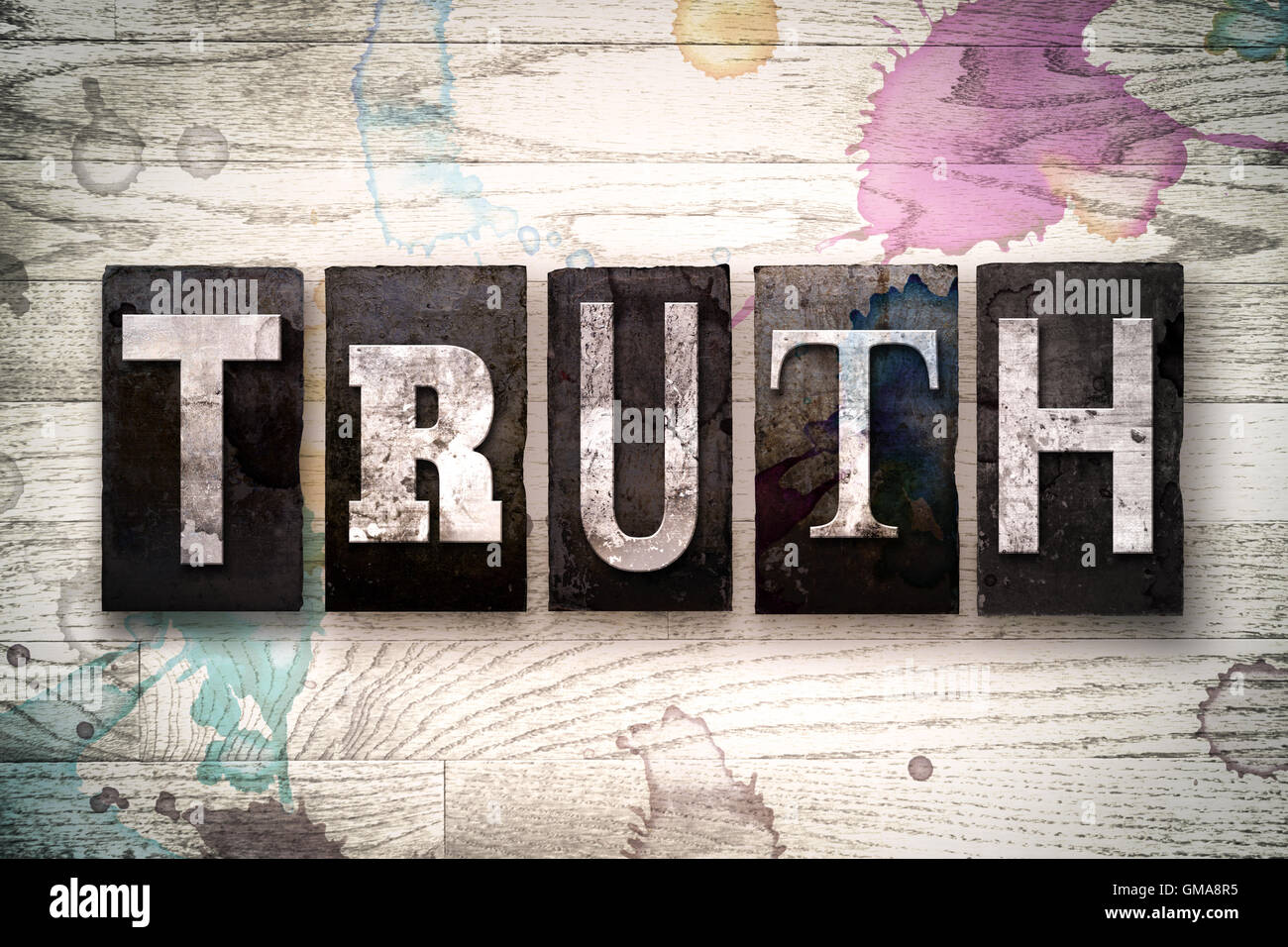 The word "TRUTH" written in vintage dirty metal letterpress type on a ...