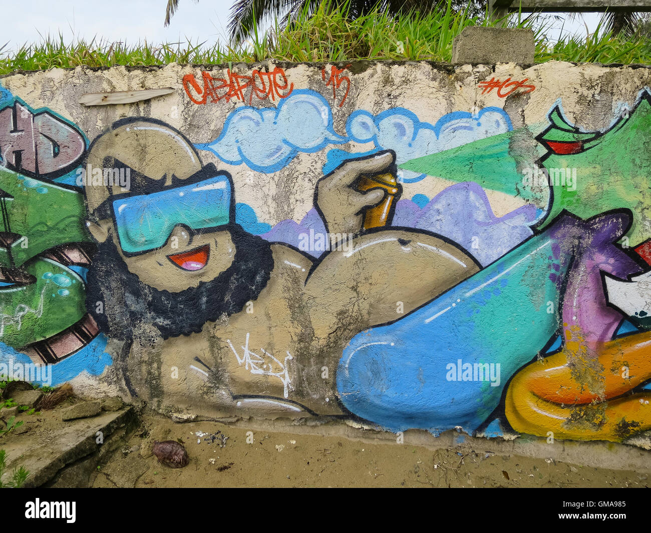 CABARETE, DOMINICAN REPUBLIC - Graffiti on wall at beach Stock Photo ...
