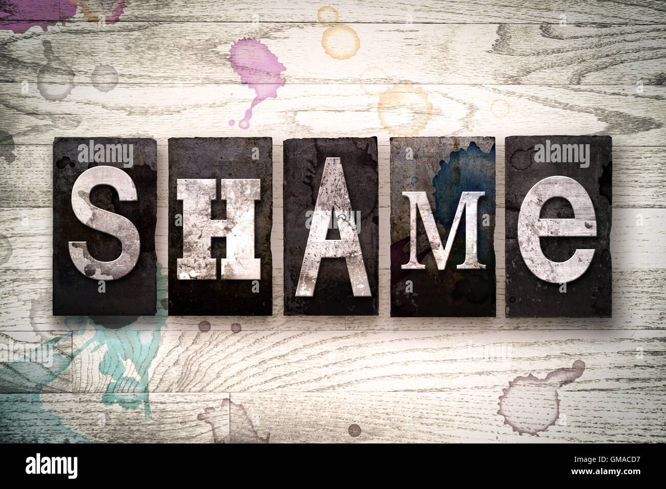 The word "SHAME" written in vintage dirty metal letterpress type on a ...