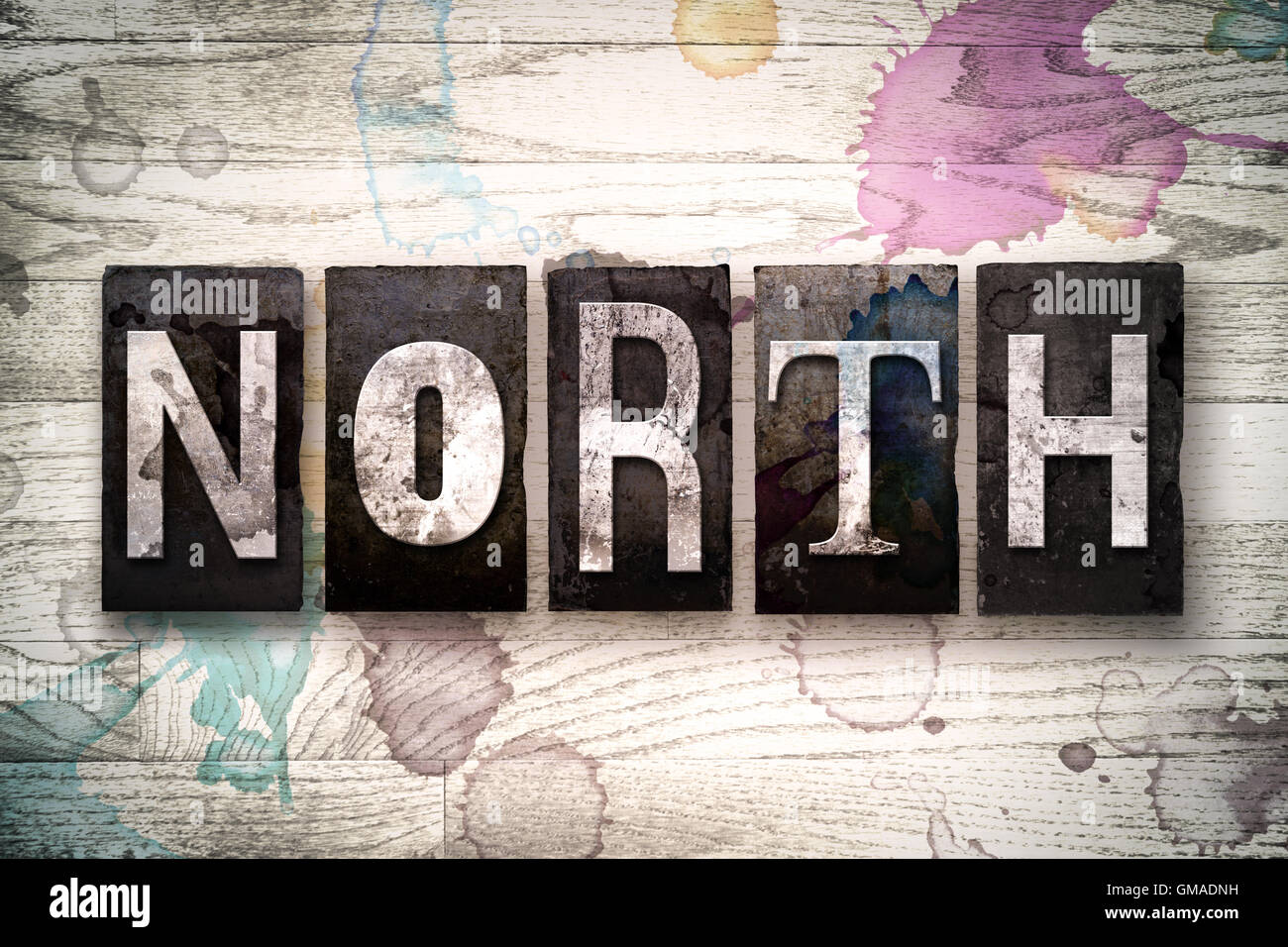The word "NORTH" written in vintage dirty metal letterpress type on a ...