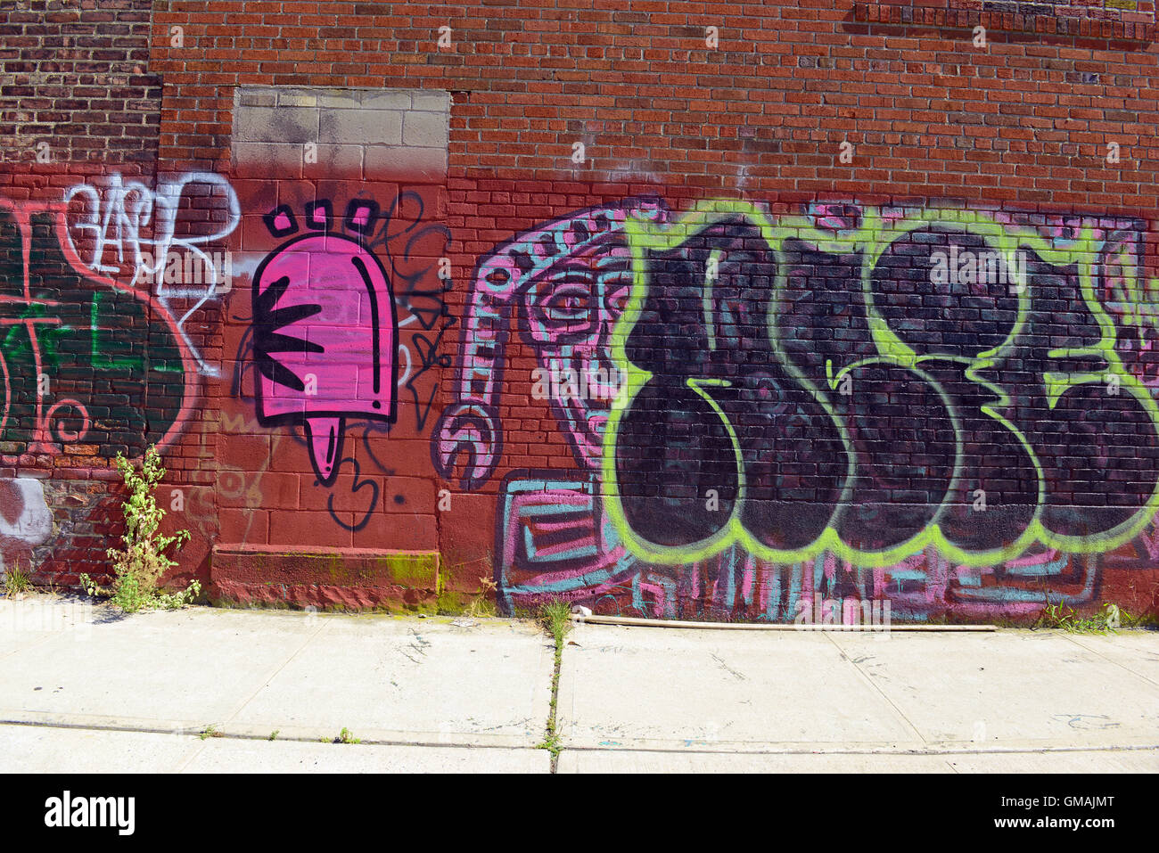 Graffiti shown on a city street Stock Photo - Alamy