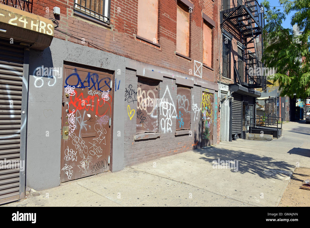 Graffiti shown on a city street Stock Photo - Alamy