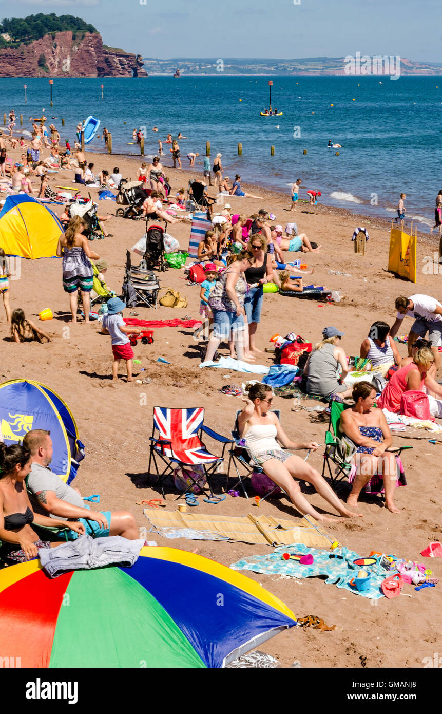 Lots people sunbathing on beach hi-res stock photography and images - Alamy