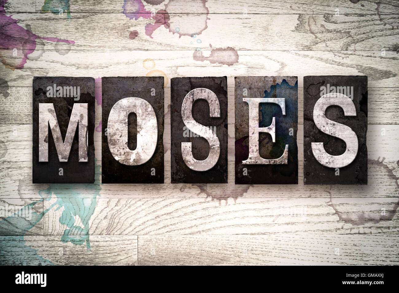 The name "MOSES" written in vintage dirty metal letterpress type on a ...