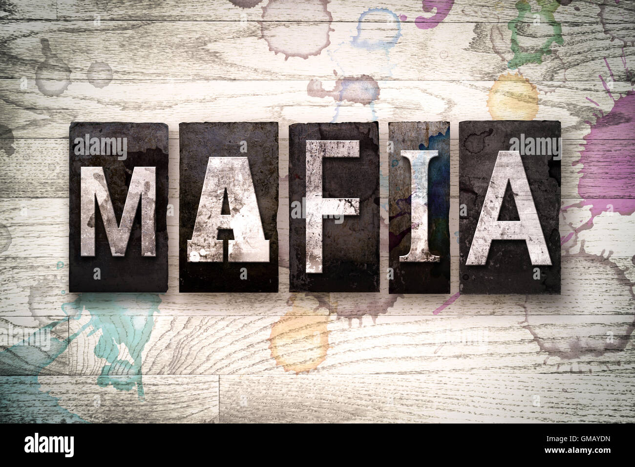 The word "MAFIA" written in vintage dirty metal letterpress type on a ...