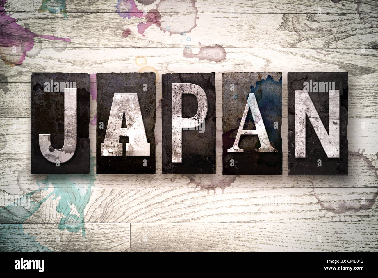 The word "JAPAN" written in vintage dirty metal letterpress type on a ...