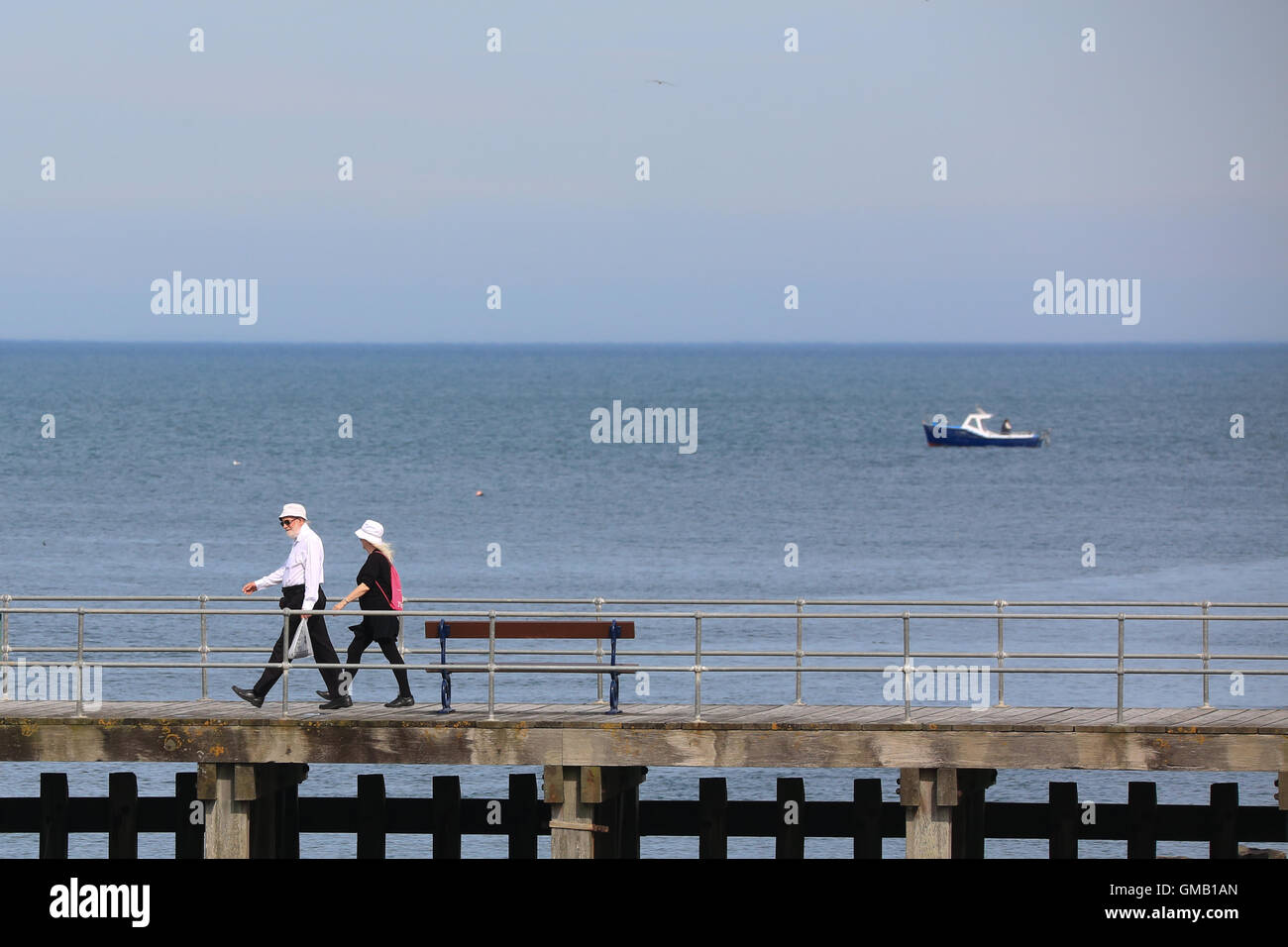 Man walking on jetty hi-res stock photography and images - Alamy