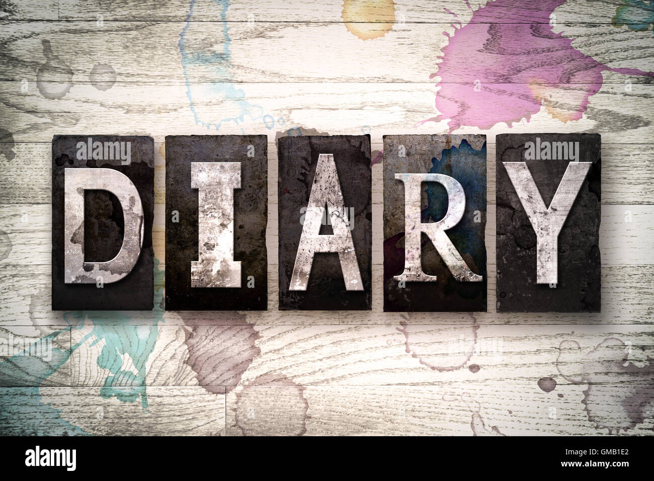 The word "DIARY" written in vintage dirty metal letterpress type on a ...