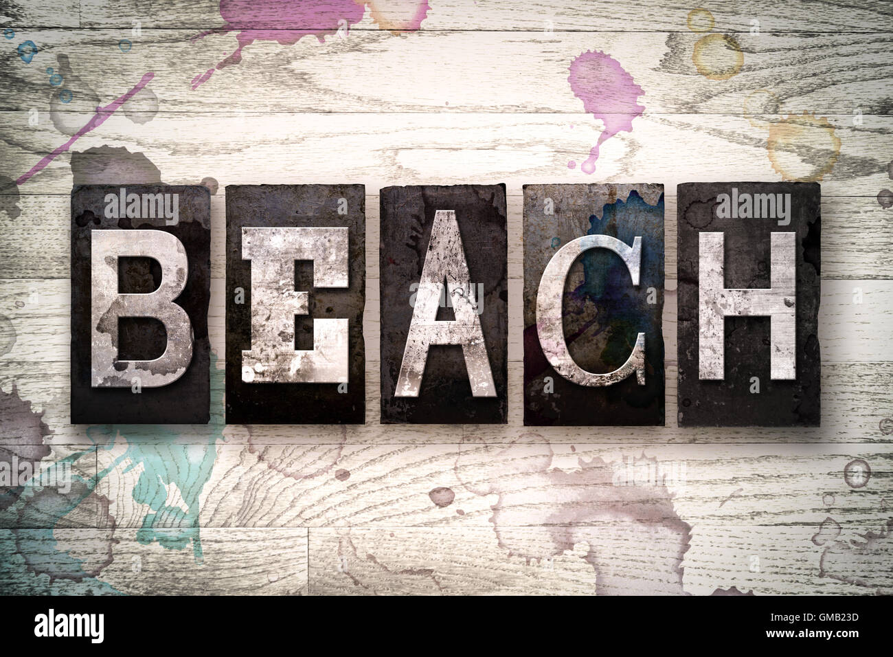 The word "BEACH" written in vintage dirty metal letterpress type on a ...