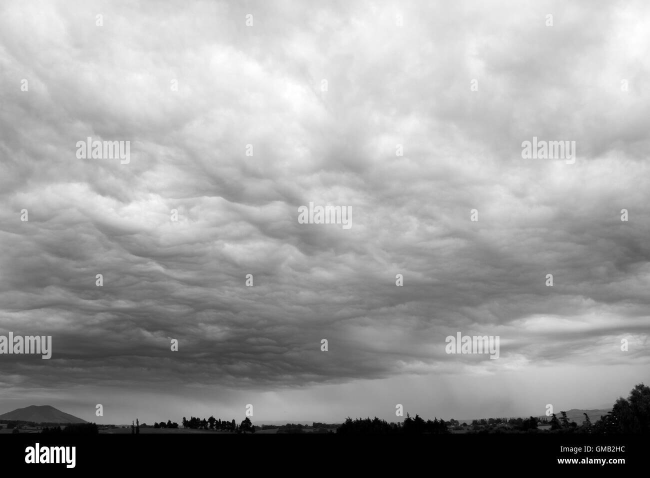 Grey clouds in sky Stock Photo - Alamy