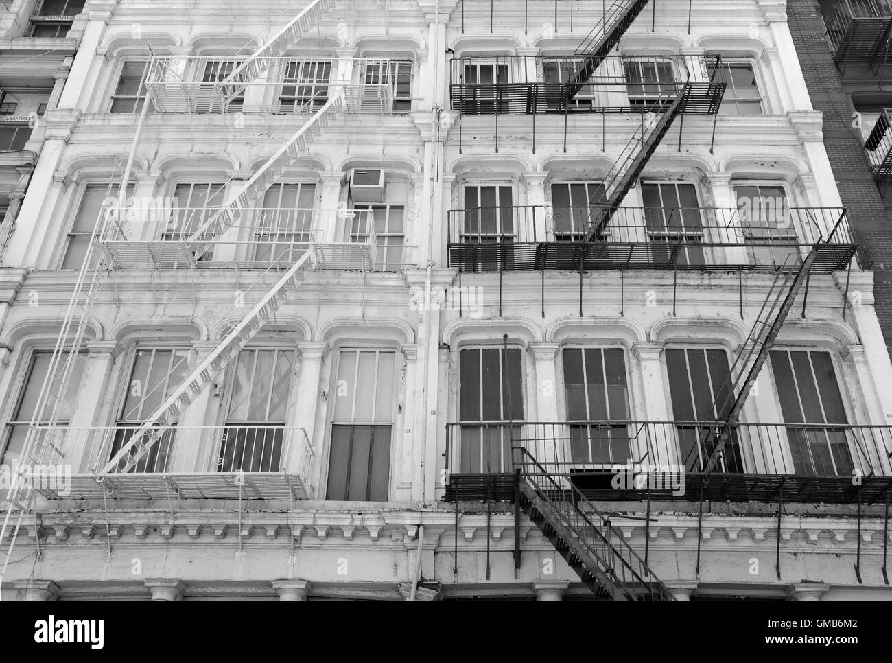 Fire escape on exterior of walk up apartment building in New York City ...