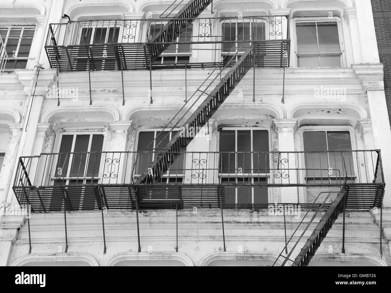 Fire escape on exterior of walk up apartment building in New York City ...