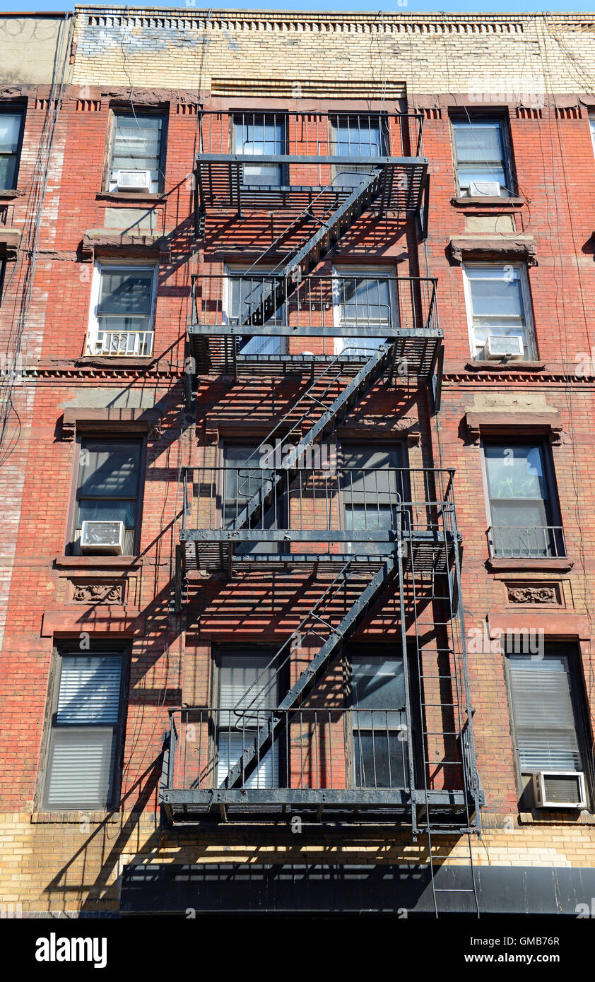 Fire escape on exterior of walk up apartment building in New York City ...