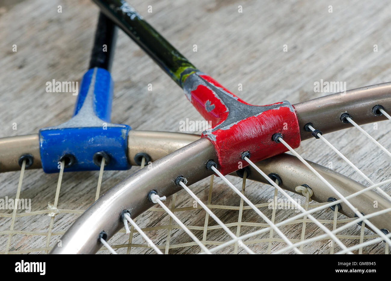 Old badminton racket on wooden background in close up view Stock Photo ...