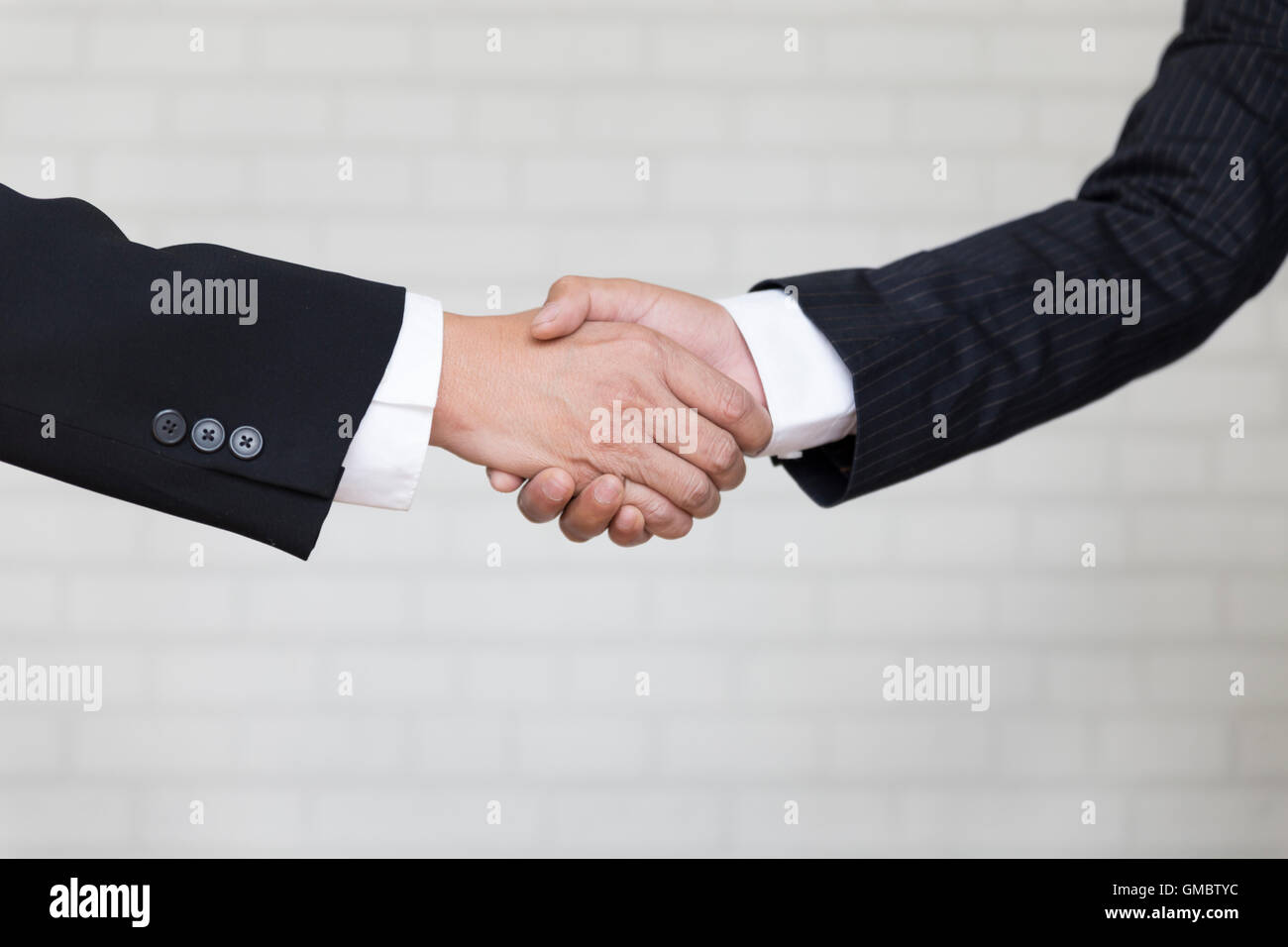two businessman shaking hands - business teamwork, cooperation concept ...