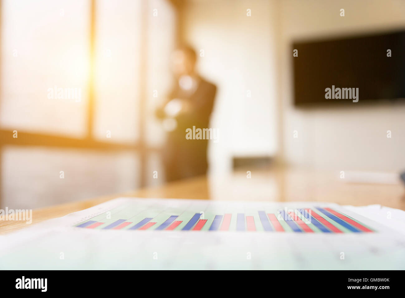 business analysis chart report with background of businessman in suit ...