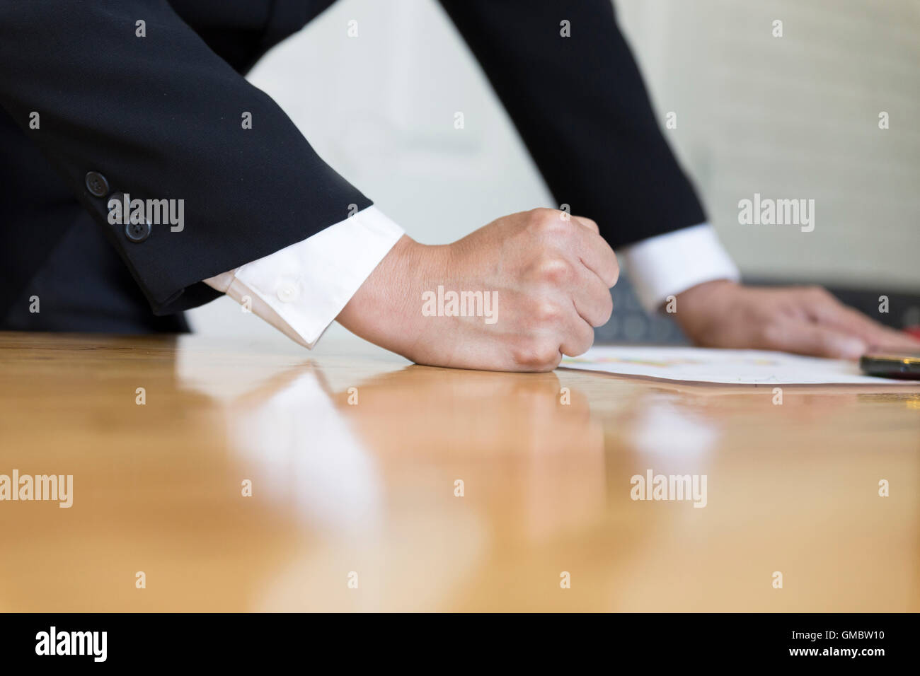 Man fist desk office hi-res stock photography and images - Alamy