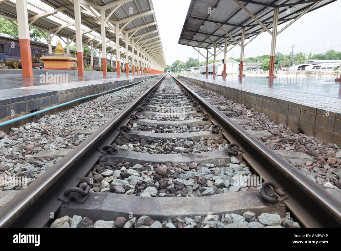 platform and railway at train station Stock Photo - Alamy