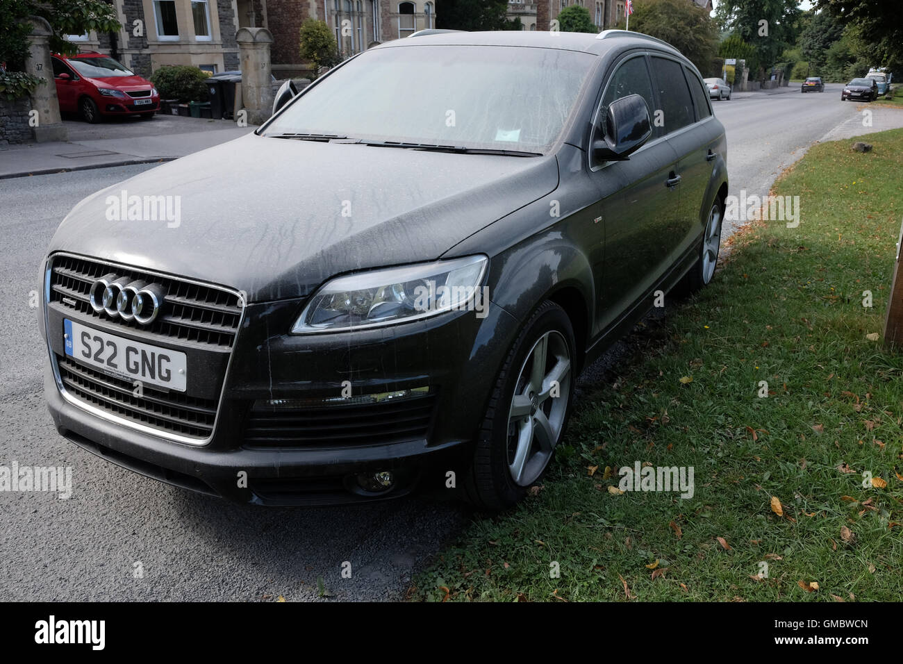Very dirty and dusty cars parked where surface dressing has been taking ...