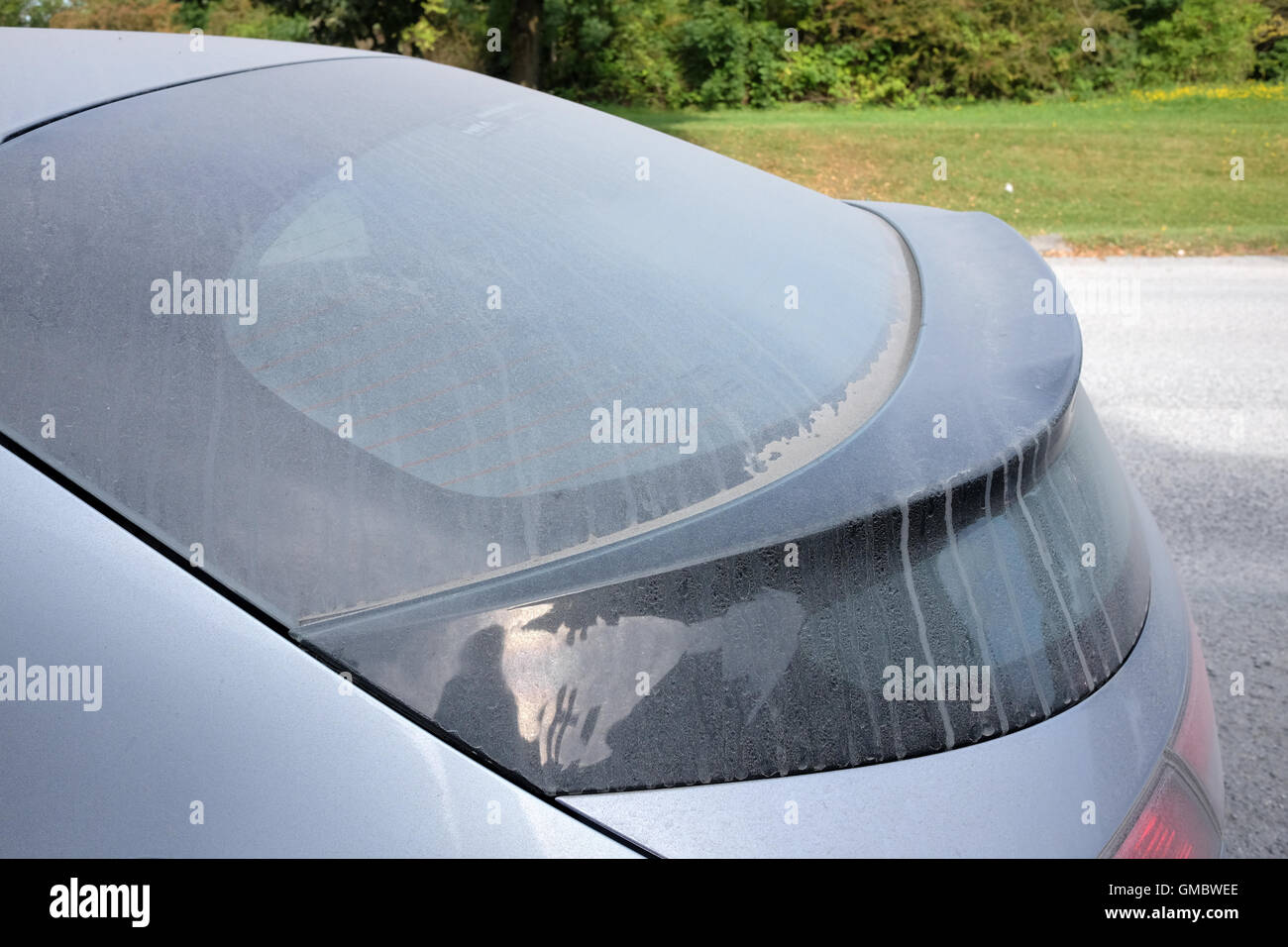Very dirty and dusty cars parked where surface dressing has been taking ...