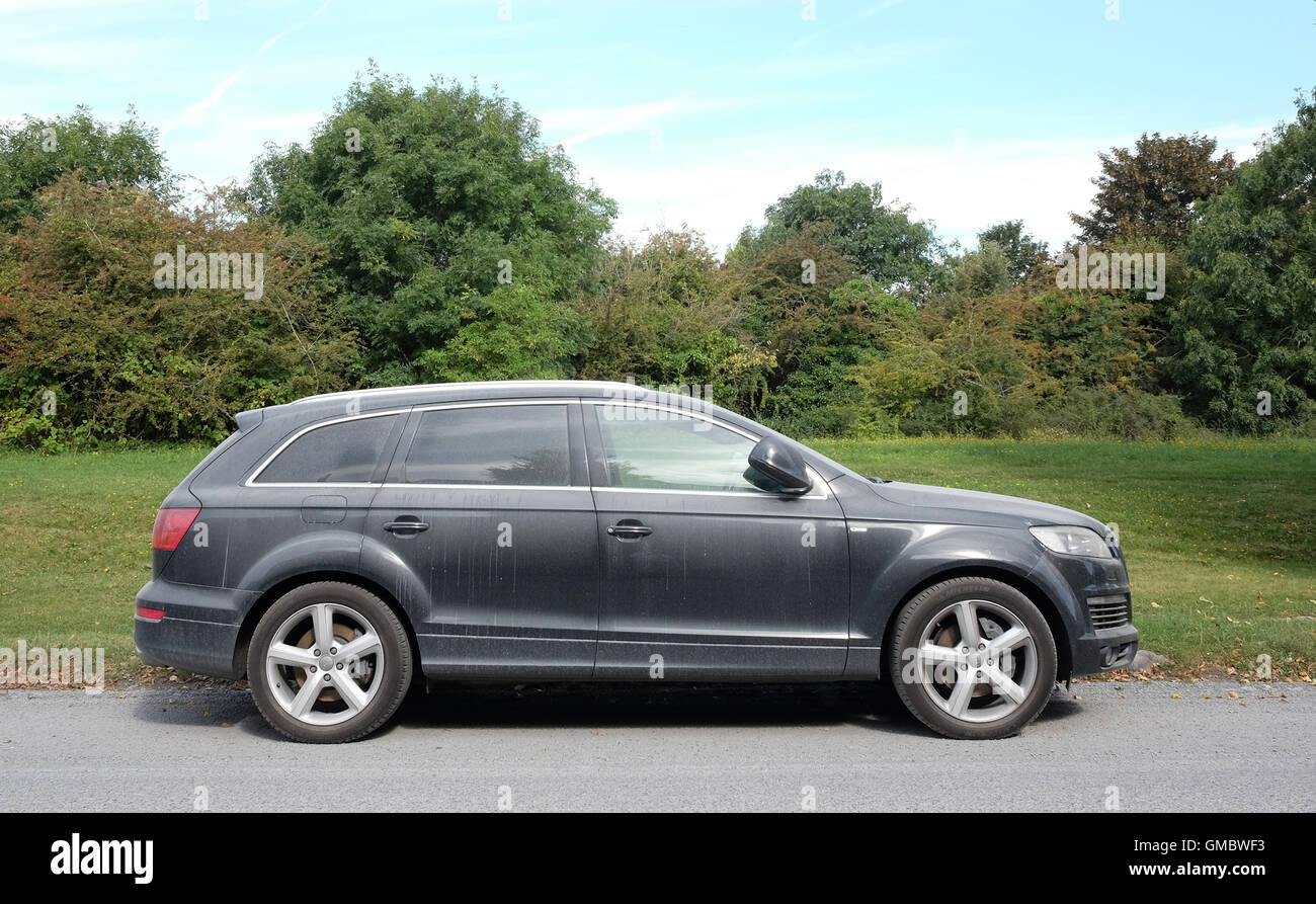 Very dirty and dusty cars parked where surface dressing has been taking ...